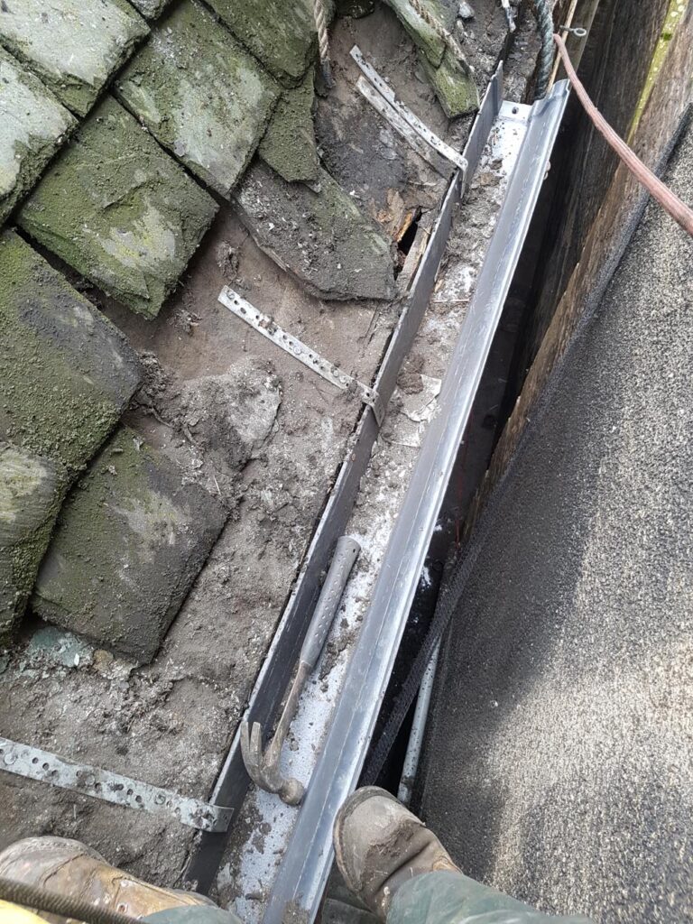 Cast iron gutter repairs, slate patching, and gutter cleaning ...