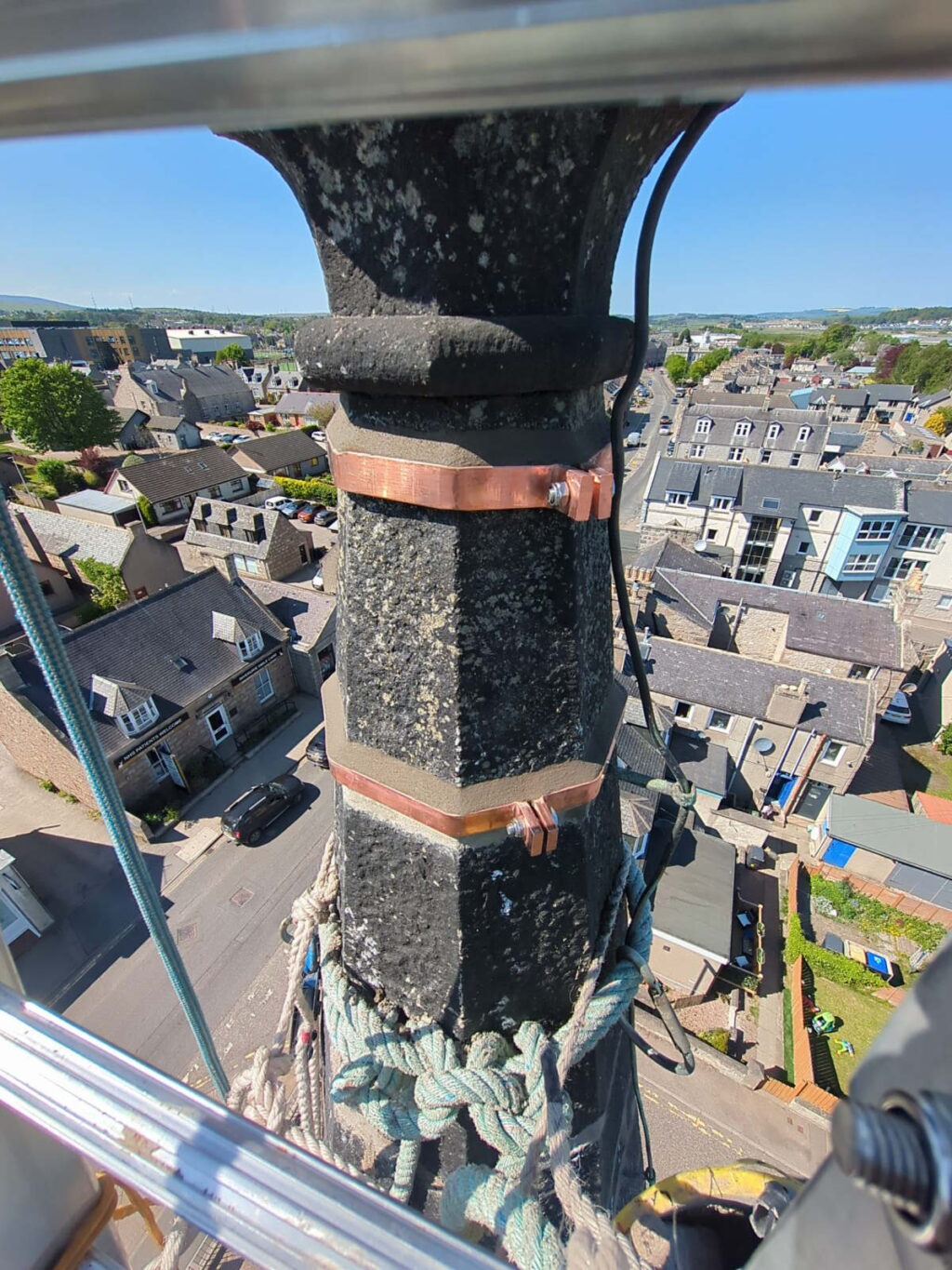 Fitting of copper bands to spire head – BCM Steeplejacks – Scotland