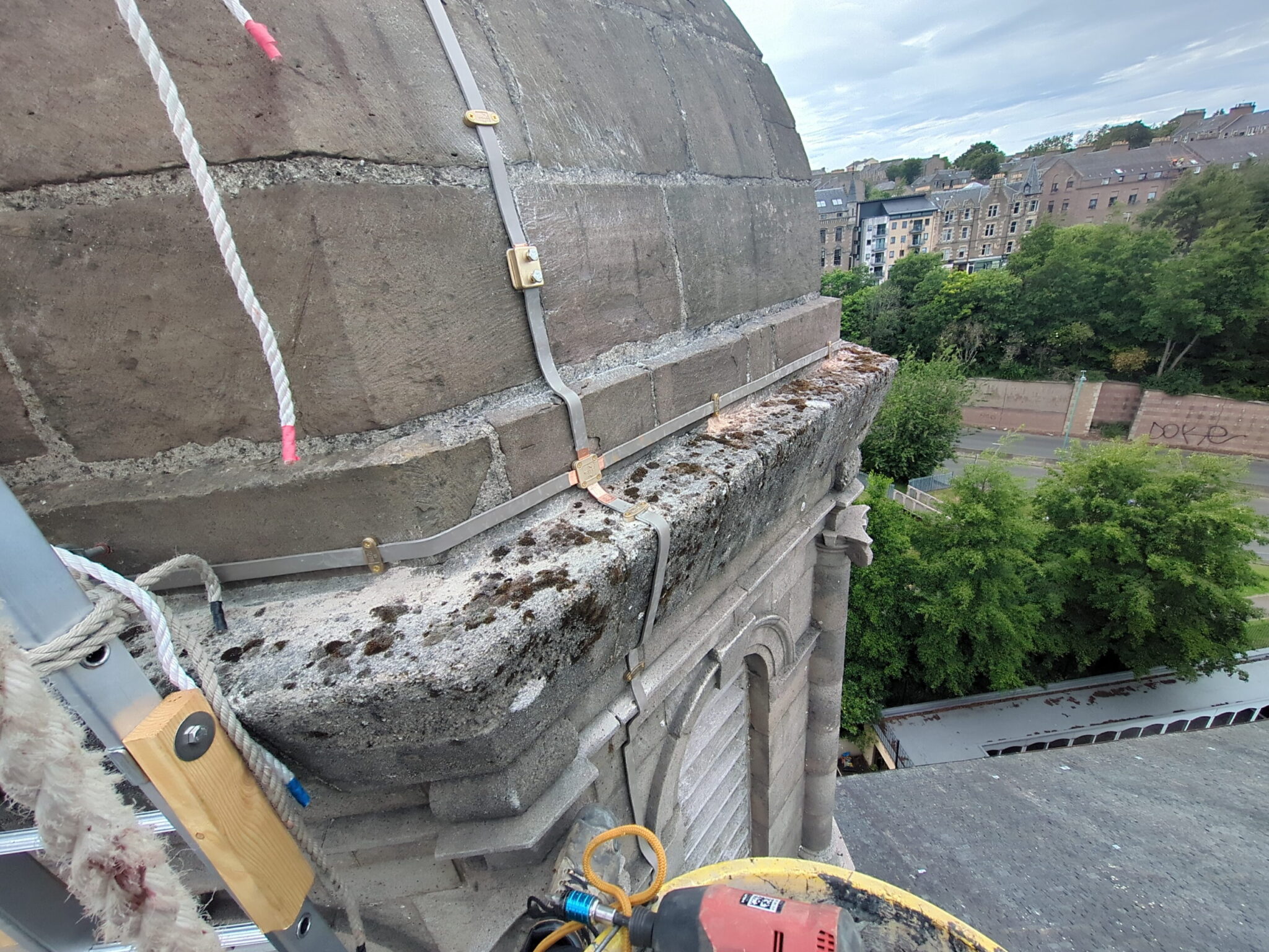 New copper lightning conductor tape installed on a church spire – BCM ...